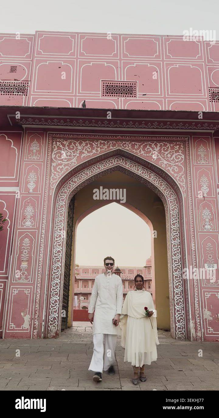 Couple Walking Through Pink Palace Entrance in Jaipur, India Stock ...