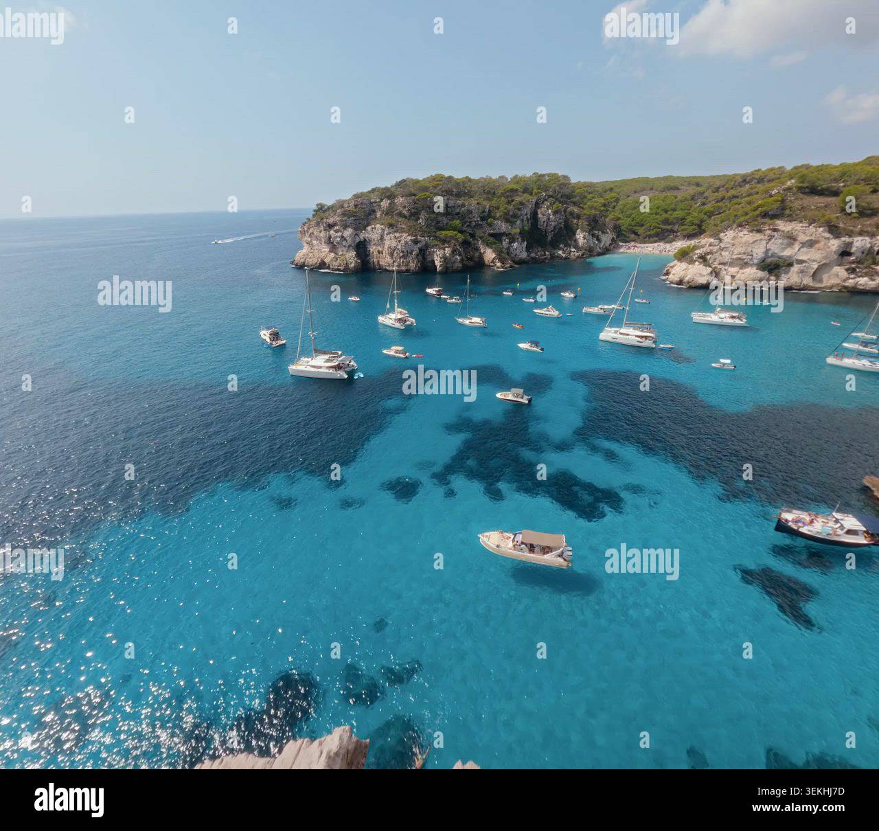 FPV drone over Cala Macarella and Macarelleta in Menorca, Spain Stock ...