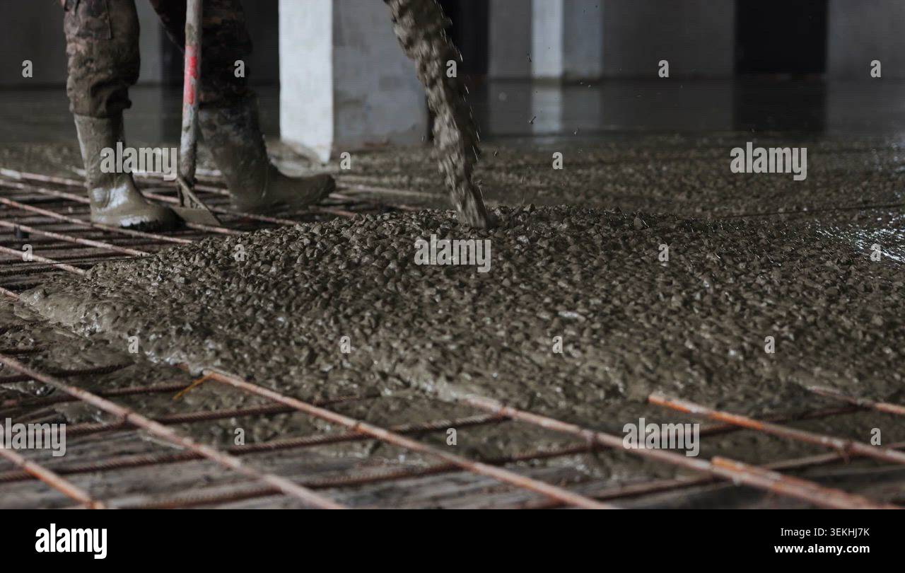 Pouring Concrete Over Rebar For Floor Slab Stock Video Footage - Alamy