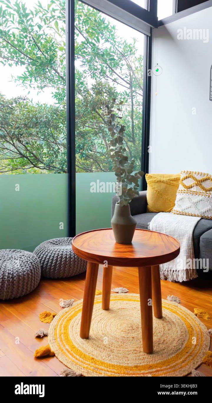 living room with large windows and decor Stock Video Footage - Alamy