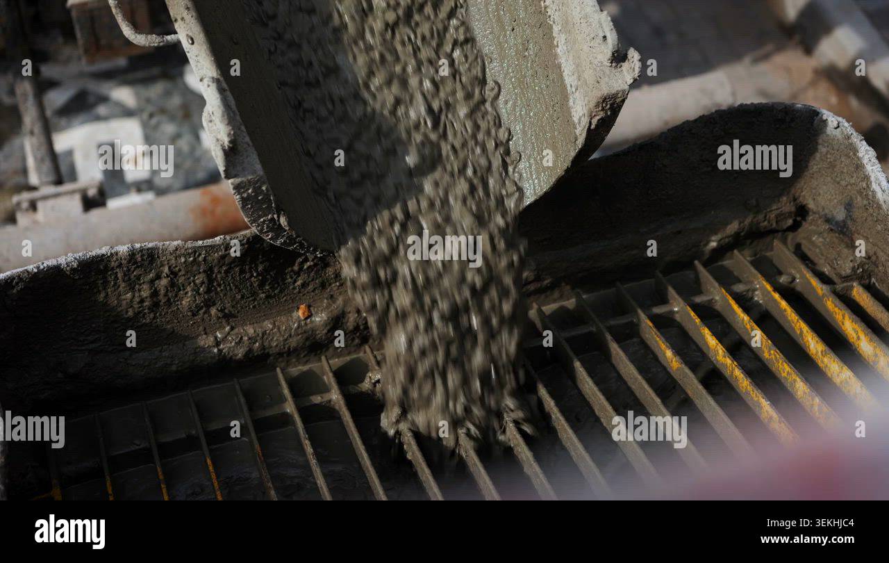 Concrete Pouring Into Hopper With Metal Grid Stock Video Footage - Alamy