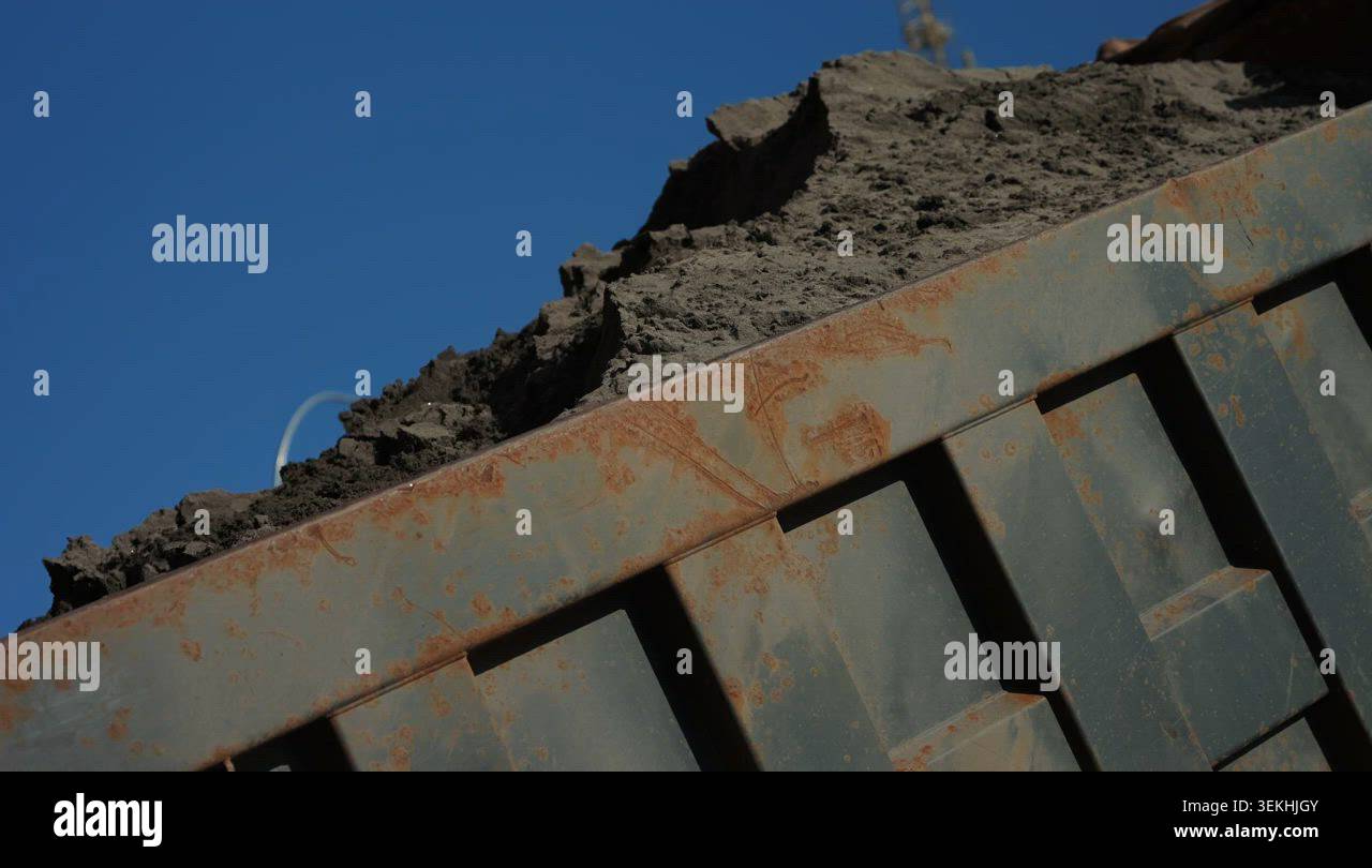 Dump Truck Unloading Soil At Construction Site Stock Video Footage - Alamy