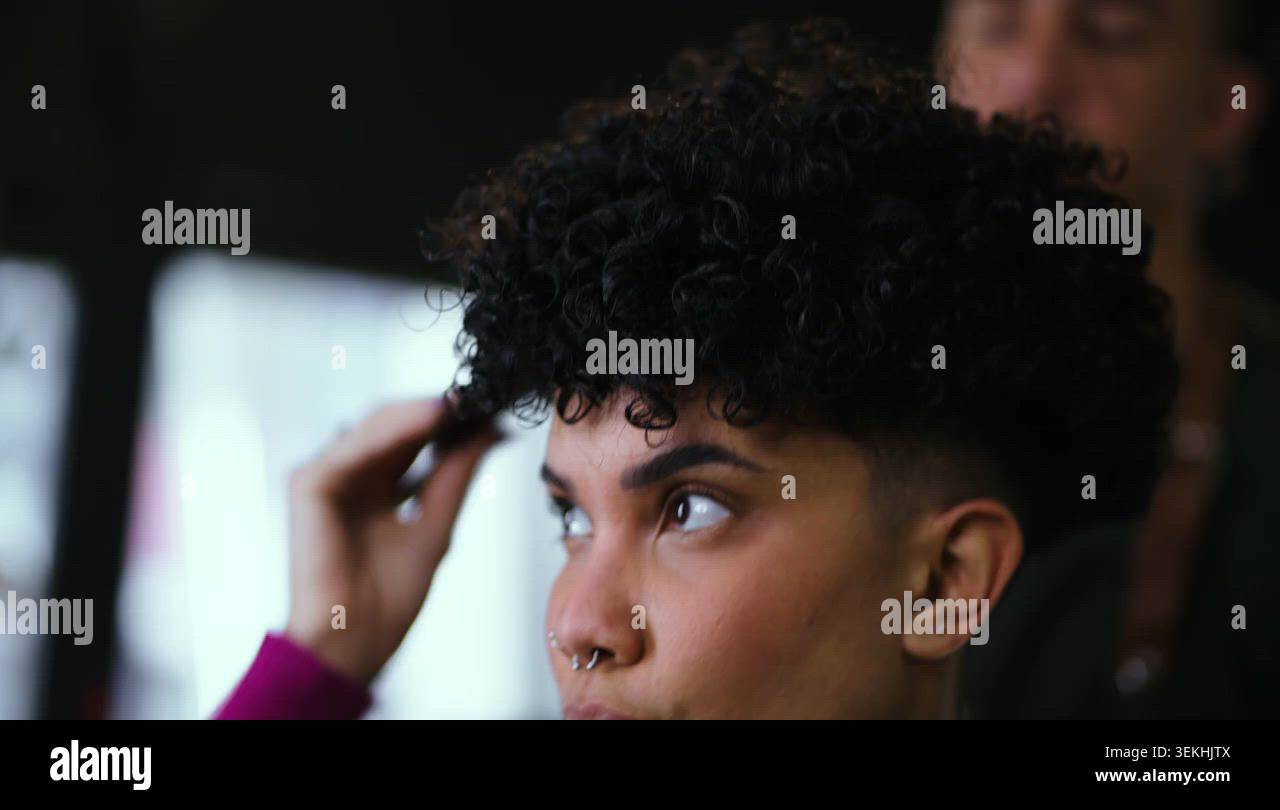 Hair styling tips for curly hair Stock Video Footage - Alamy