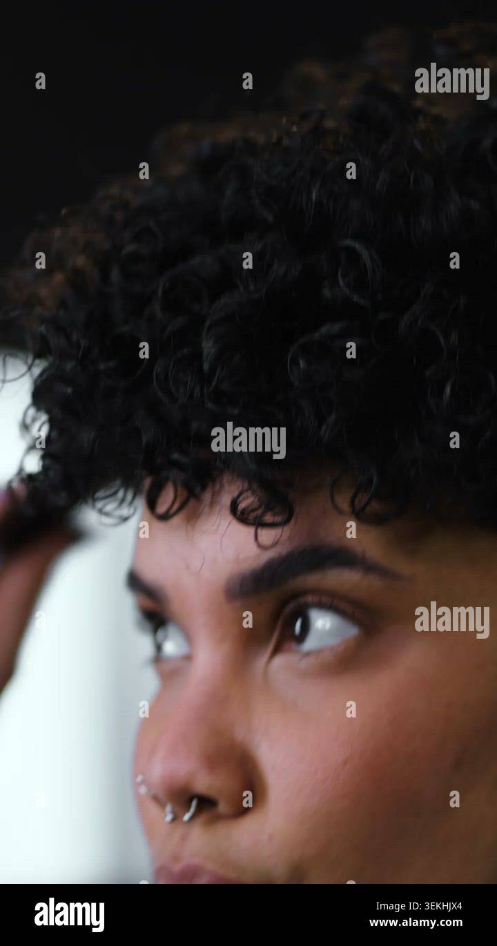 Curly hair styling tips Stock Video Footage - Alamy