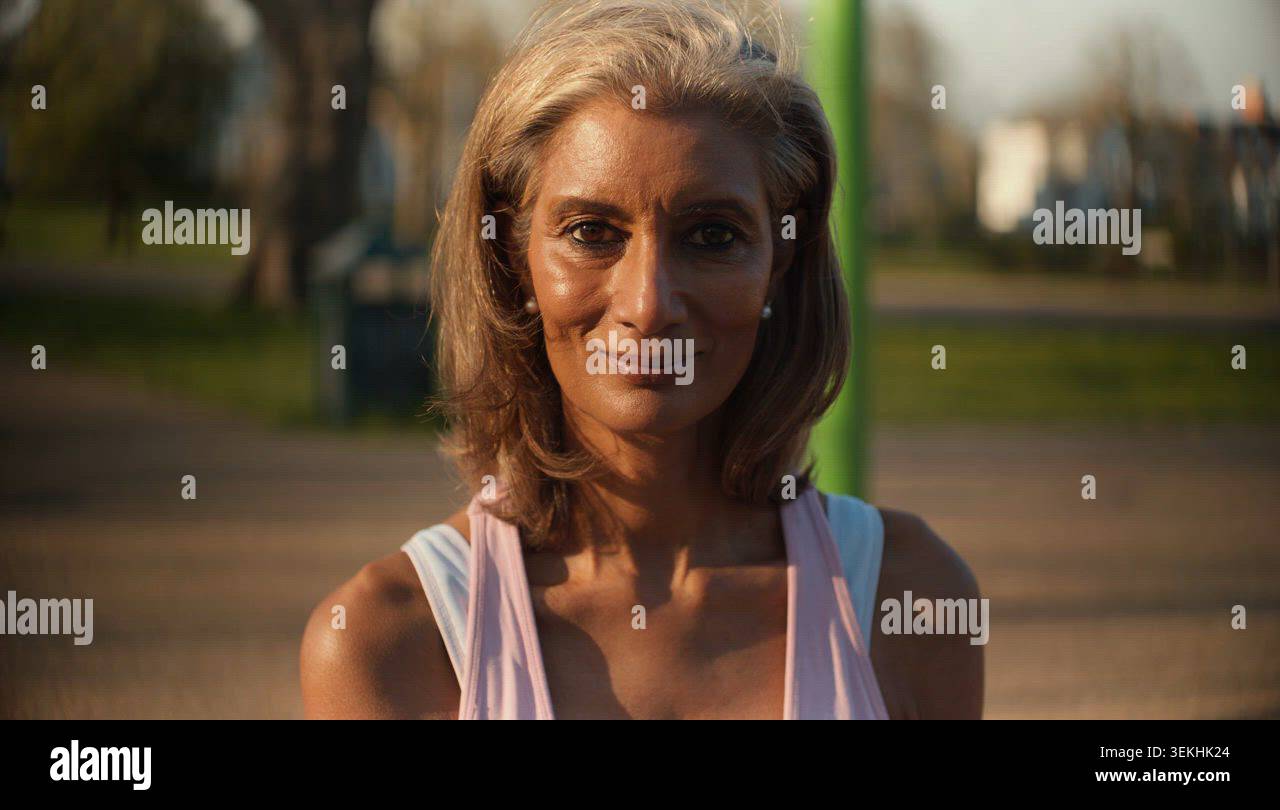 Portrait of Woman Smiling During Outdoor Workout in the Park at Sunset ...