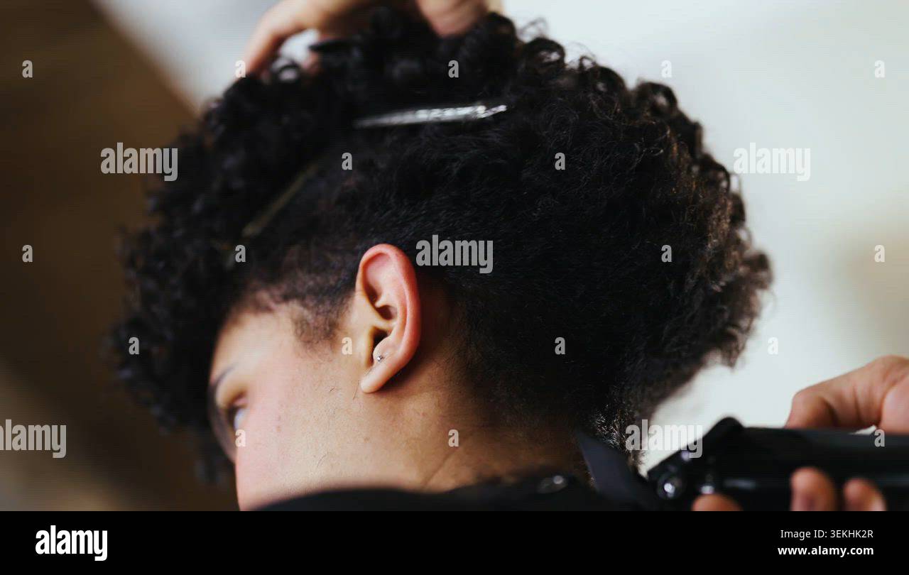 Haircut in a busy barber shop Stock Video Footage - Alamy