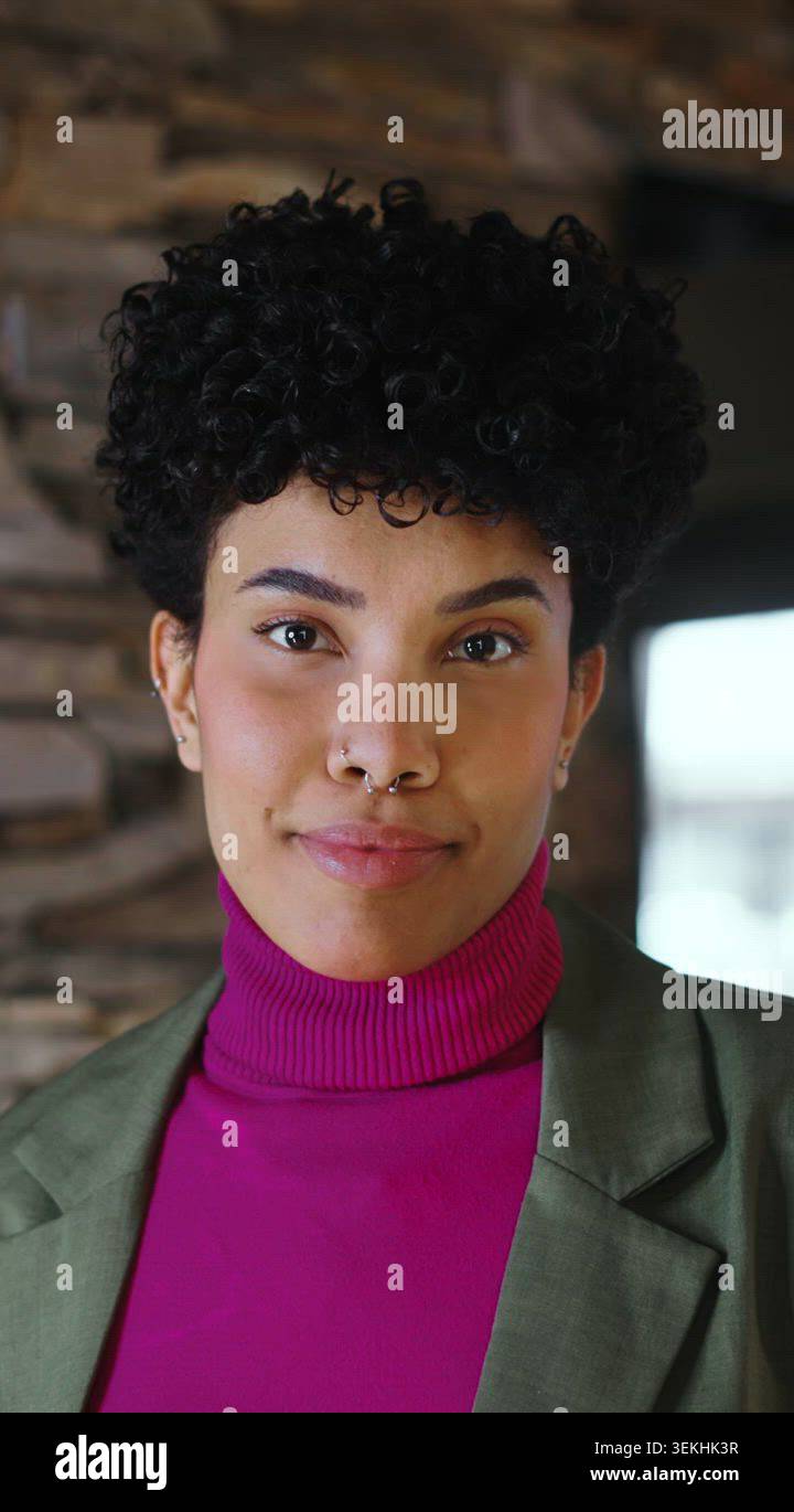 Smiling person in a cozy setting Stock Video Footage - Alamy