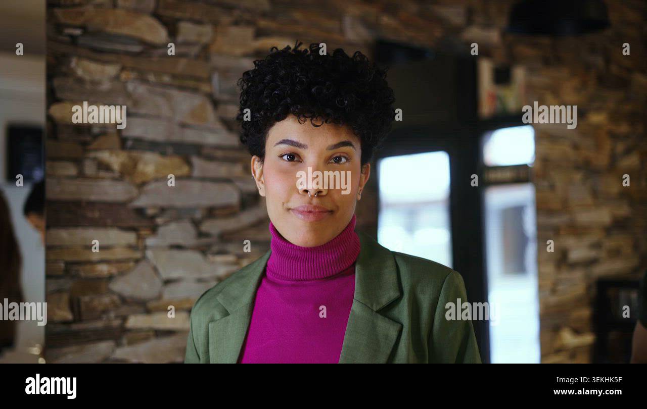 Smiling person in a cozy setting Stock Video Footage - Alamy