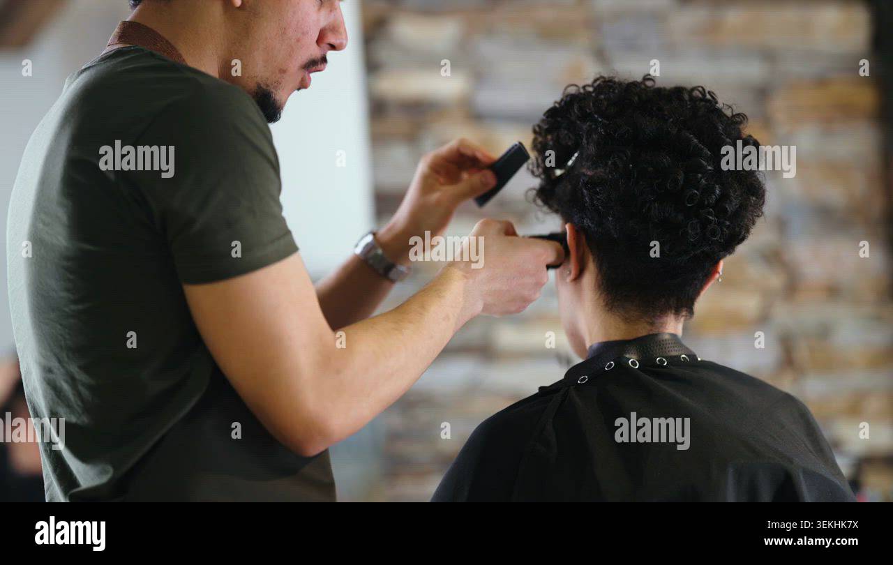 Haircut at local barber shop Stock Video Footage - Alamy