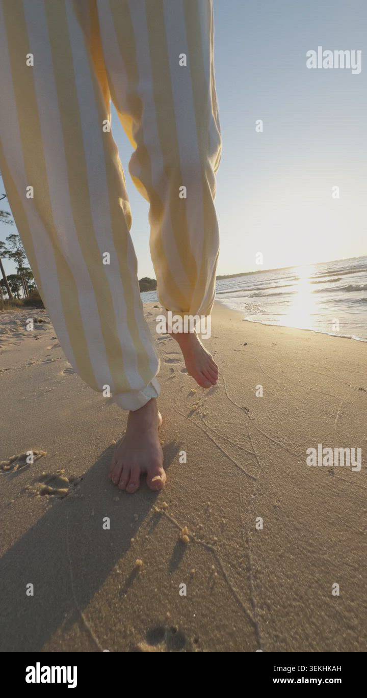Low Angle Barefoot Walk Beach Sunset Stock Video Footage - Alamy