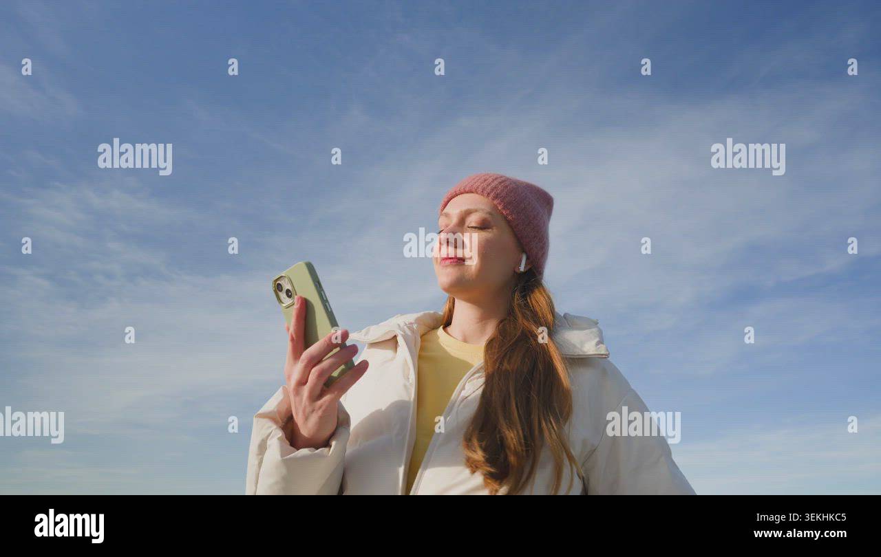 Woman Listening To Music And Dancing Under Blue Sky Stock Video Footage ...