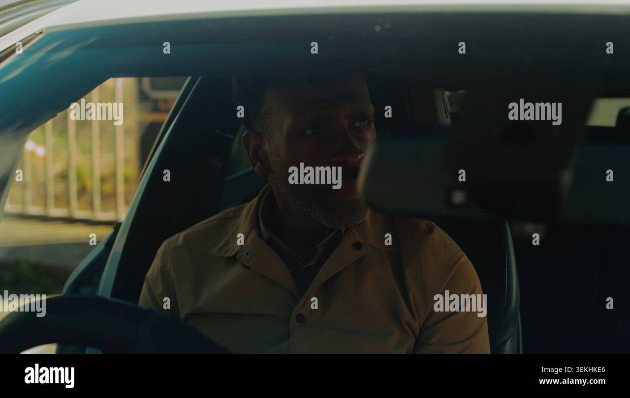 Man Inside Car Looking out During Evening Time Stock Video Footage - Alamy