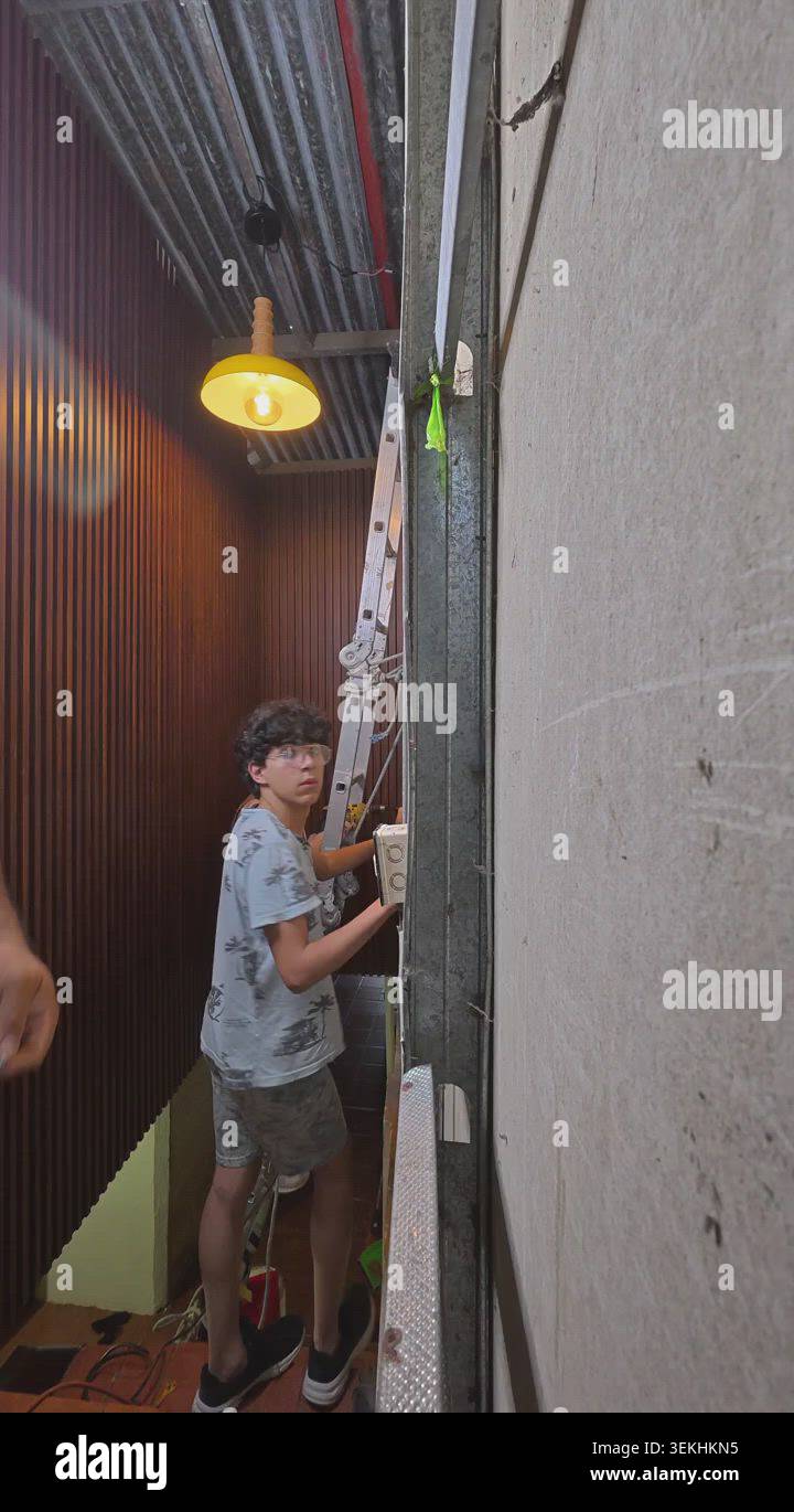 Construction workers installing corrugated wall panels Stock Video ...