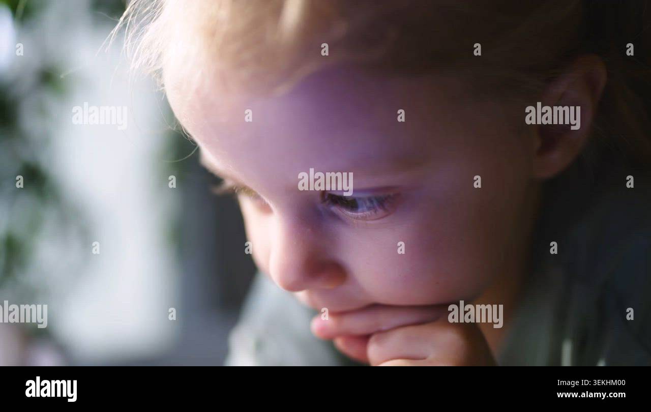 Child face illuminated by screen in close up Stock Video Footage - Alamy
