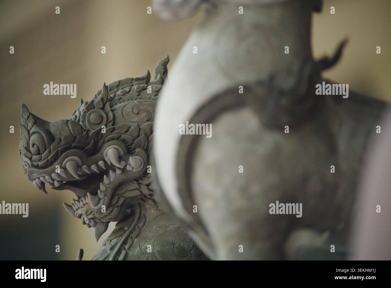6K open gate: artisan inspecting singha cement sculpture Stock Video ...