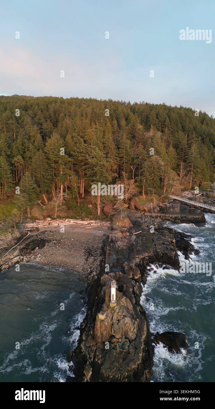 Lighthouse on Rugged Coastline - Drone Footage Stock Video Footage - Alamy