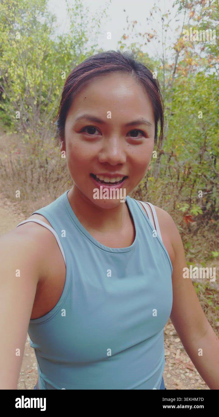 UGC Asian looking at camera walk selfie video Stock Video Footage - Alamy