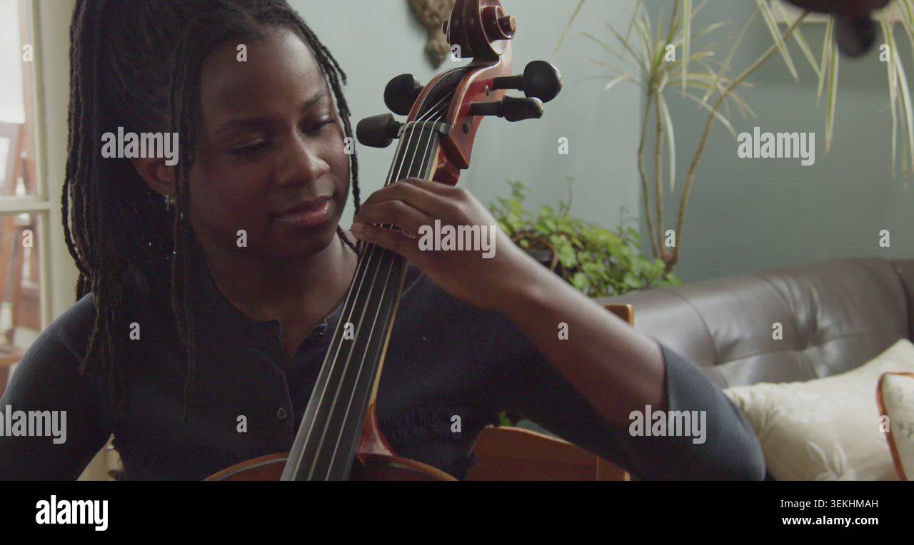 Practicing cello Stock Video Footage - Alamy