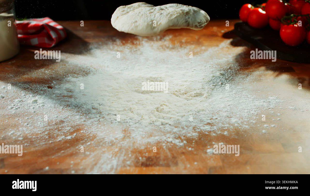 Making dough for pizza in a kitchen Stock Video Footage - Alamy