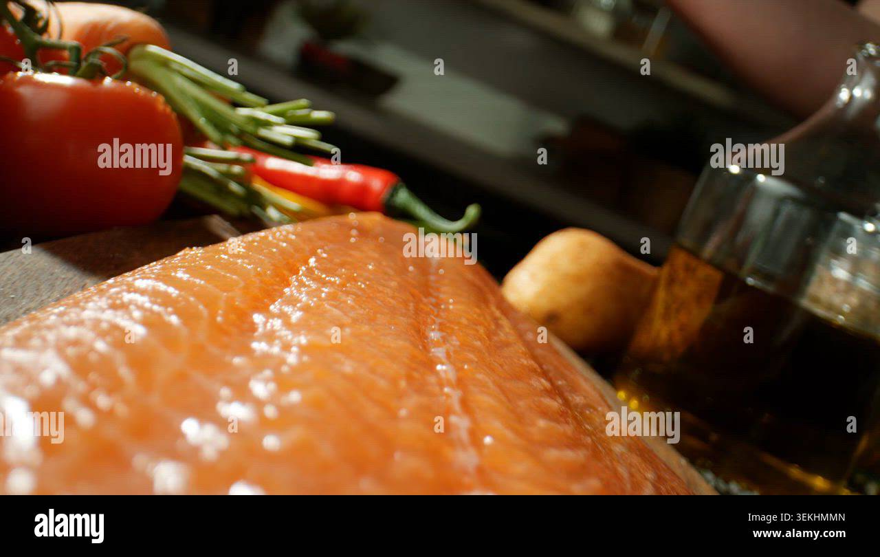 Prepare salmon with salt and spices to cook Stock Video Footage - Alamy