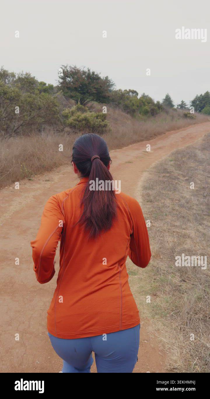 Asian fitness woman athlete dirt trail Running alone Stock Video ...