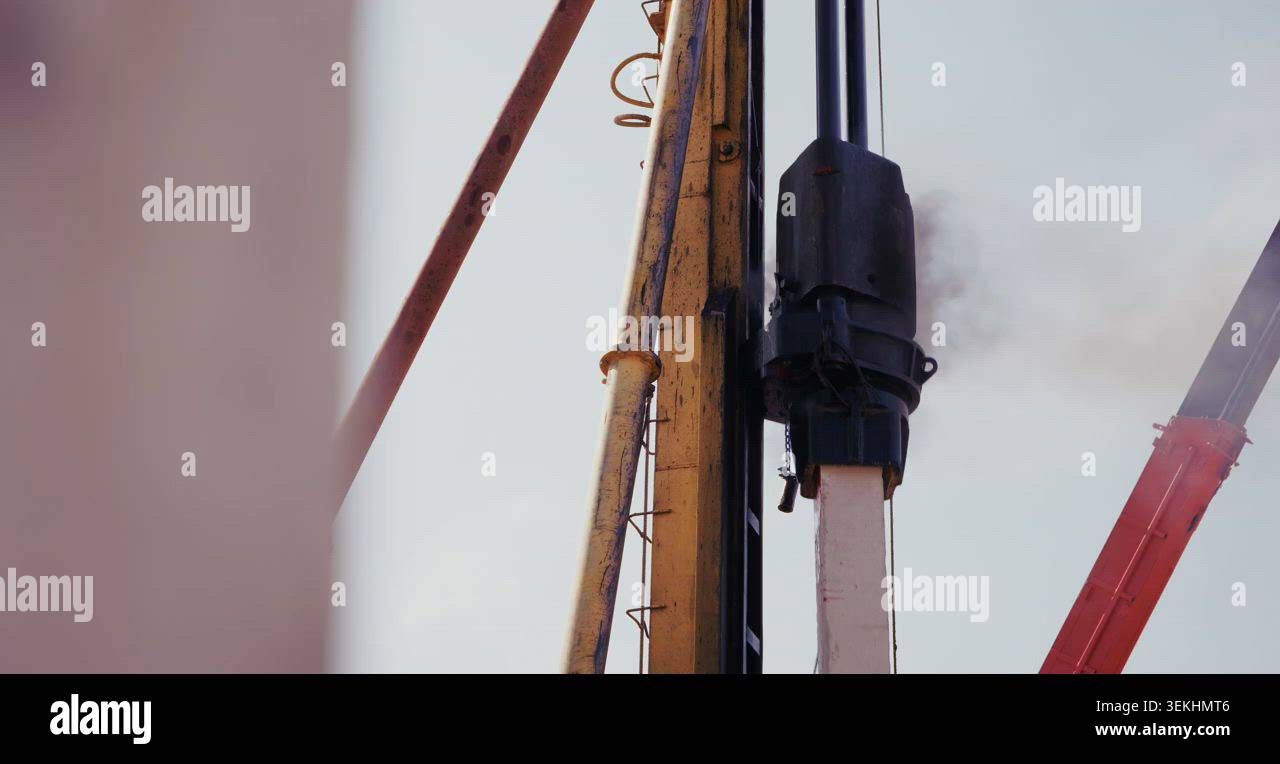 Pile driving rig pressing concrete pile Stock Video Footage - Alamy