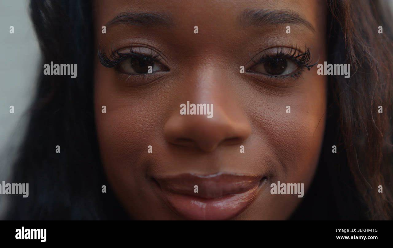 close portrait of a woman with a nose ring smiling Stock Video Footage ...