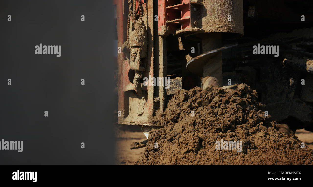 Auger drilling soil with earth extraction Stock Video Footage - Alamy
