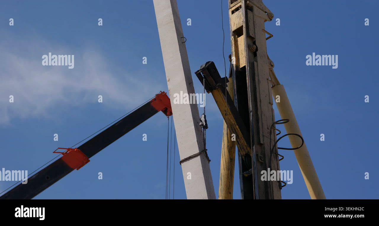 Positioning concrete pile for driving Stock Video Footage - Alamy
