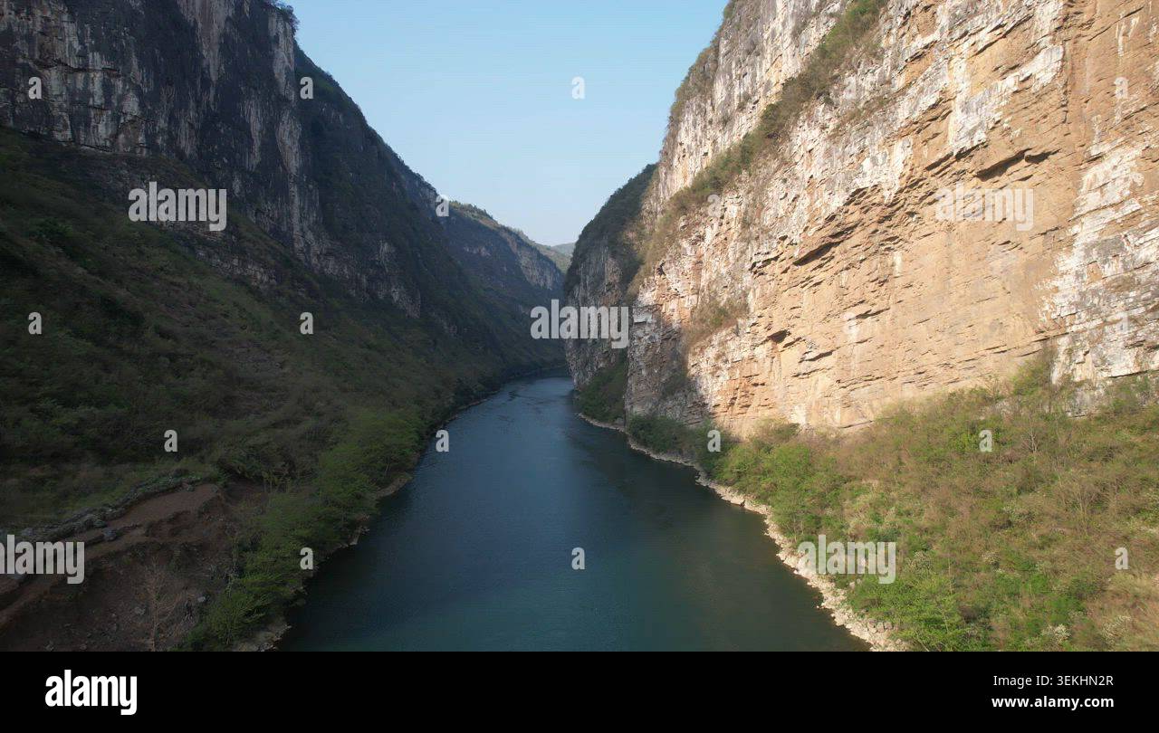 Low Drone Flight Along River Surrounded by Rocky Cliffs Stock Video ...