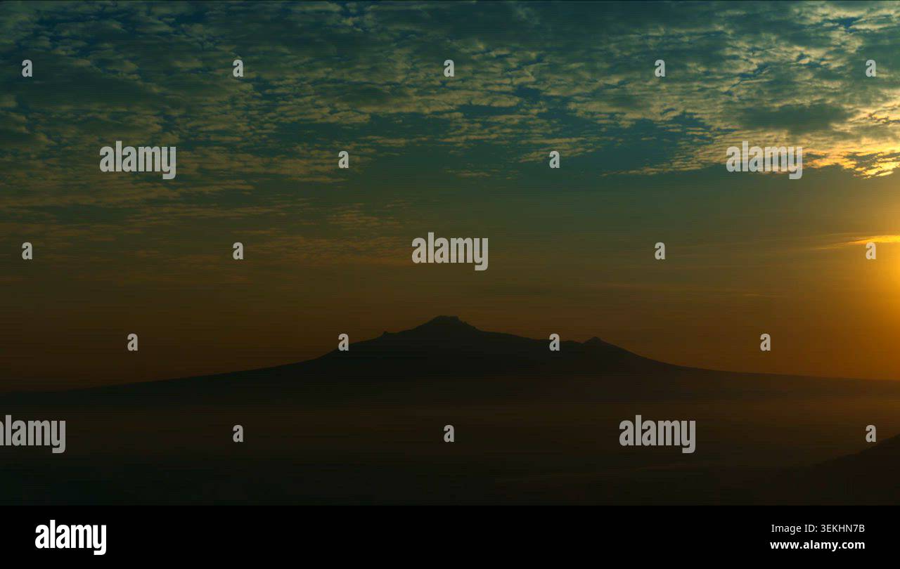Sunrise Over Mountains With Clouds in the Sky Stock Video Footage - Alamy