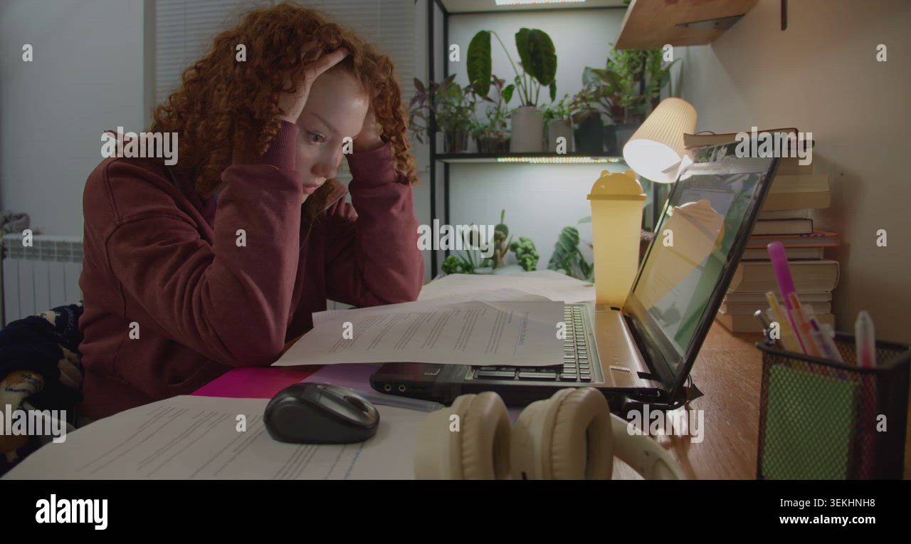 Stressed student studying late at night Stock Video Footage - Alamy