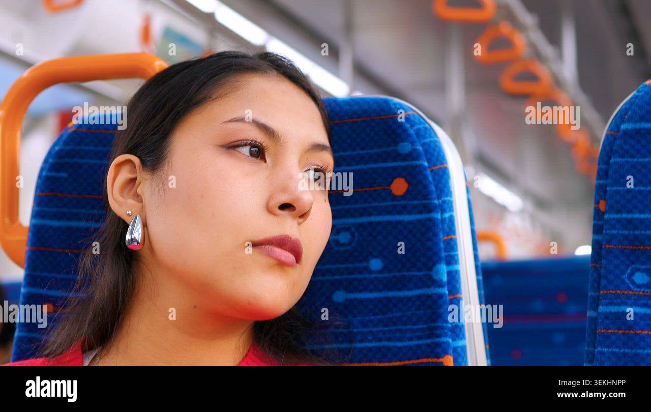 Serious woman looking out window Stock Video Footage - Alamy