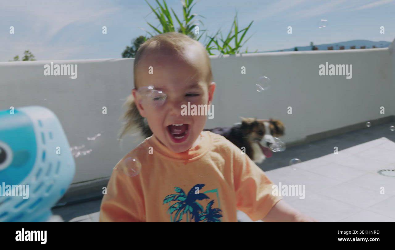 Child playing with bubble gun Stock Video Footage - Alamy