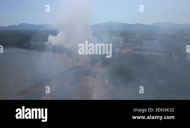 Drone footage capturing a landfill fire from above Stock Video Footage ...