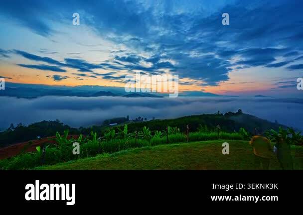 Time lapse of Foggy Mountains Under Blue Sky Stock Video Footage - Alamy