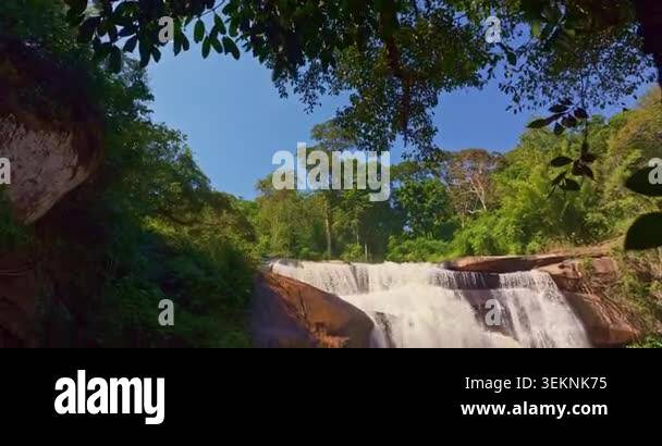 Tat Huang Waterfall surrounded by the natural scenery of Loei Province ...