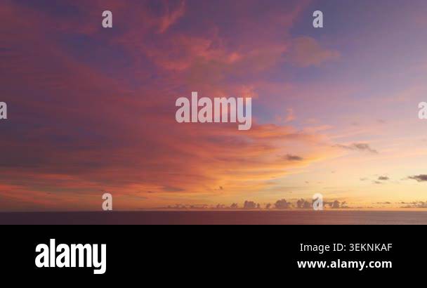 Aerial View of Colorful Clouds Above a Sunset Beach Stock Video Footage ...