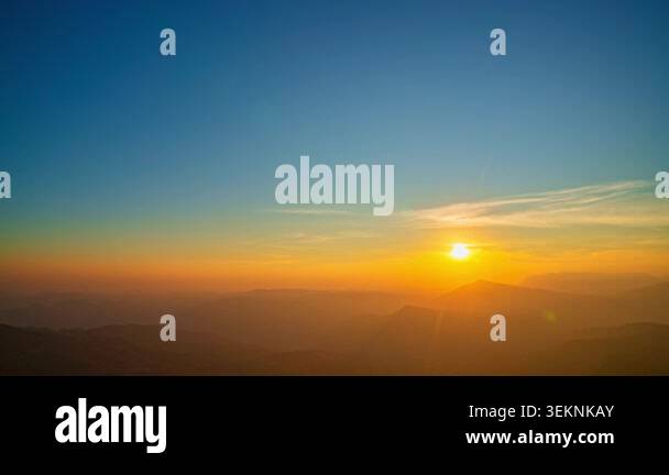 Vibrant twilight sky above mountain landscapes in time lapse Stock ...