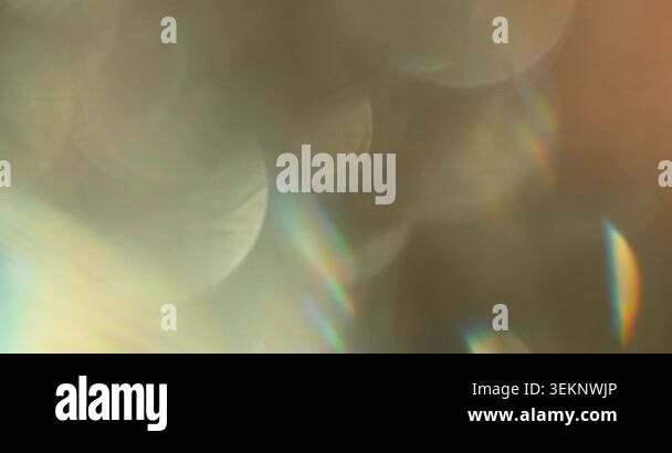 Slow motion of lens flare isolated on black background. Colored ...