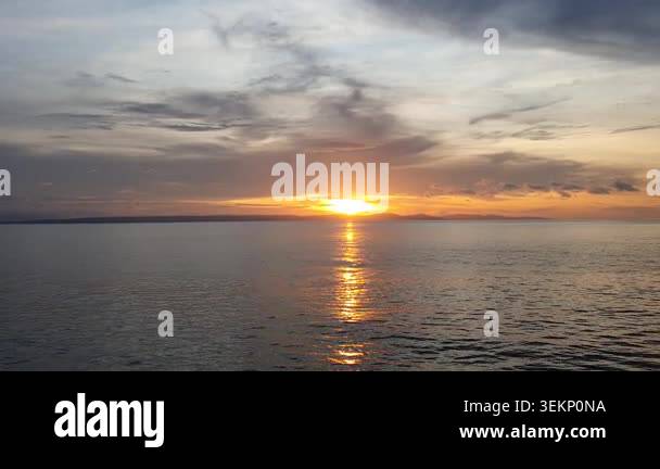 beautiful sunset over the sea Stock Video Footage - Alamy