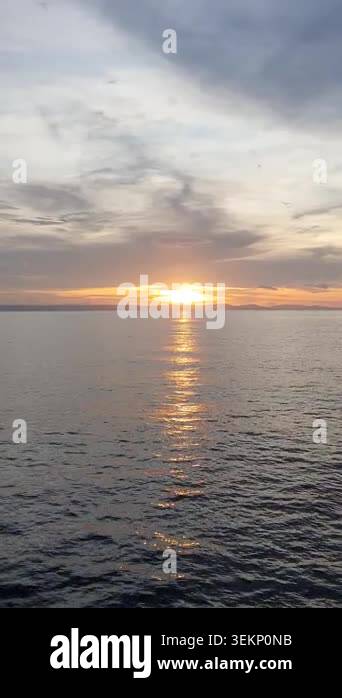 sunset over the sea Stock Video Footage - Alamy