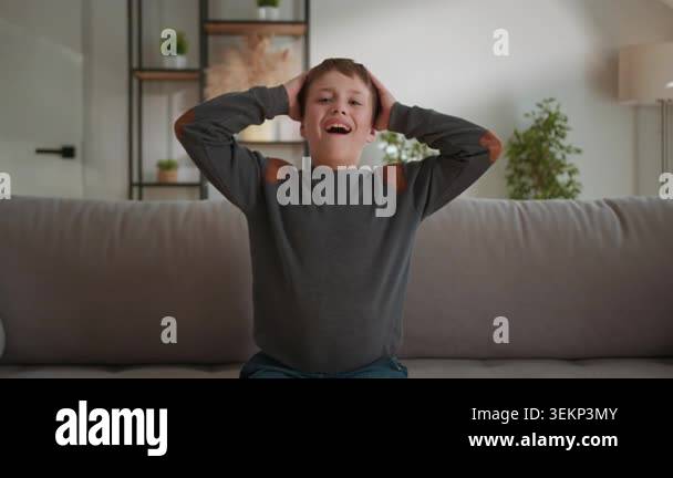 Young boy expresses extreme frustration and distress by screaming with ...