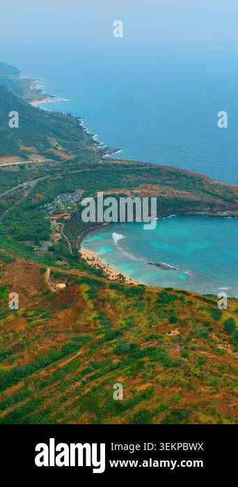 High aerial view of crescent shaped Hanauma Bay with turquoise water ...