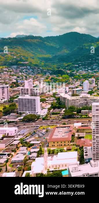 Aerial view of Honolulu residential and commercial buildings with lush ...