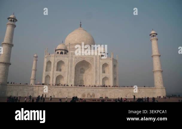 Majestic view of the Taj Mahal. The iconic ivory-white marble mausoleum ...