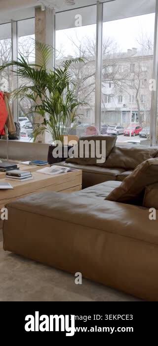 Modern Living Room Interior with Comfortable Leather Sofa, Wooden Table ...
