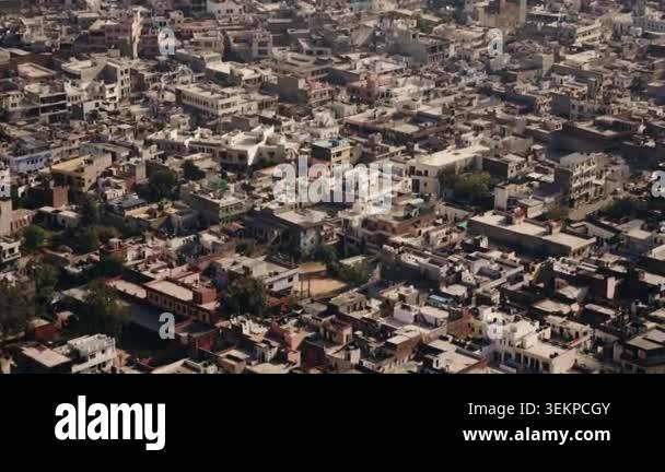 Expansive aerial perspective showing the rooftops and buildings of a ...
