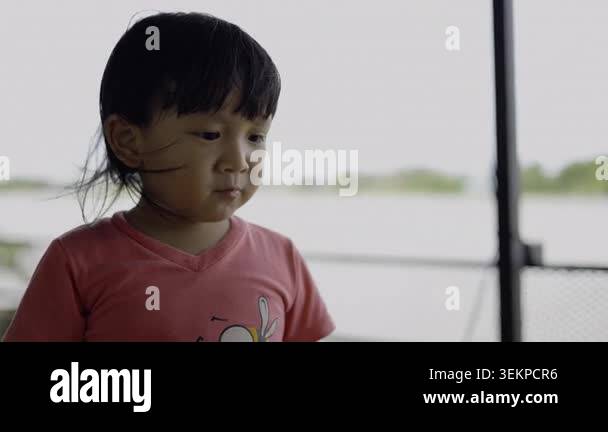 Child Is Sleeping On The Bed In The Afternoon, A serene documentary ...