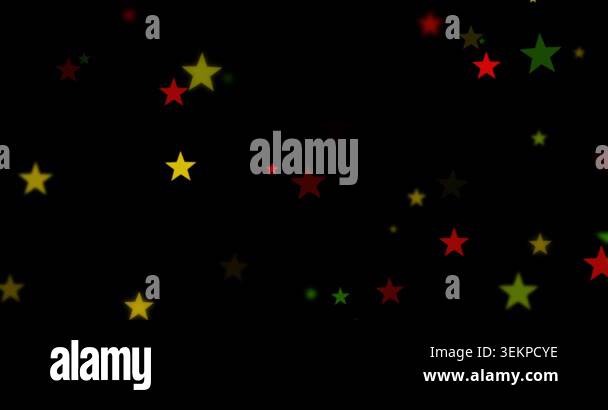 Stars twinkling in bold red, yellow, and green colors flashing on black ...